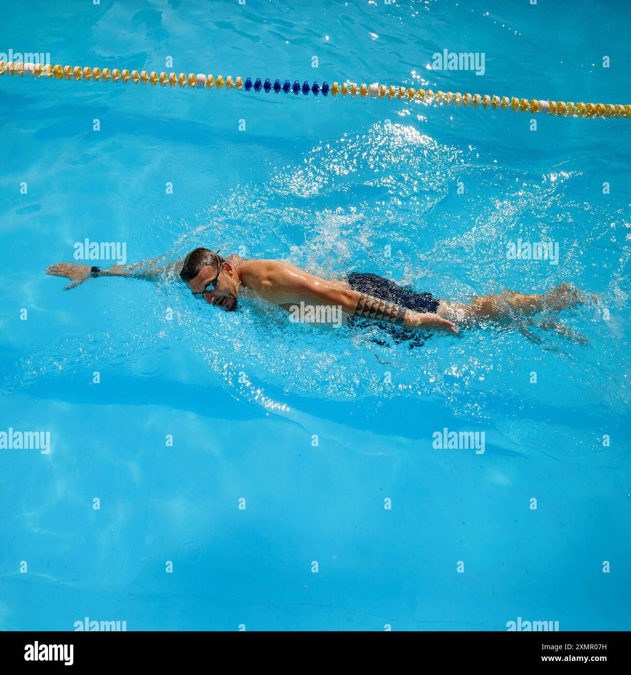 Muscular male swimmer wearing swim hi-res stock photography and images ...