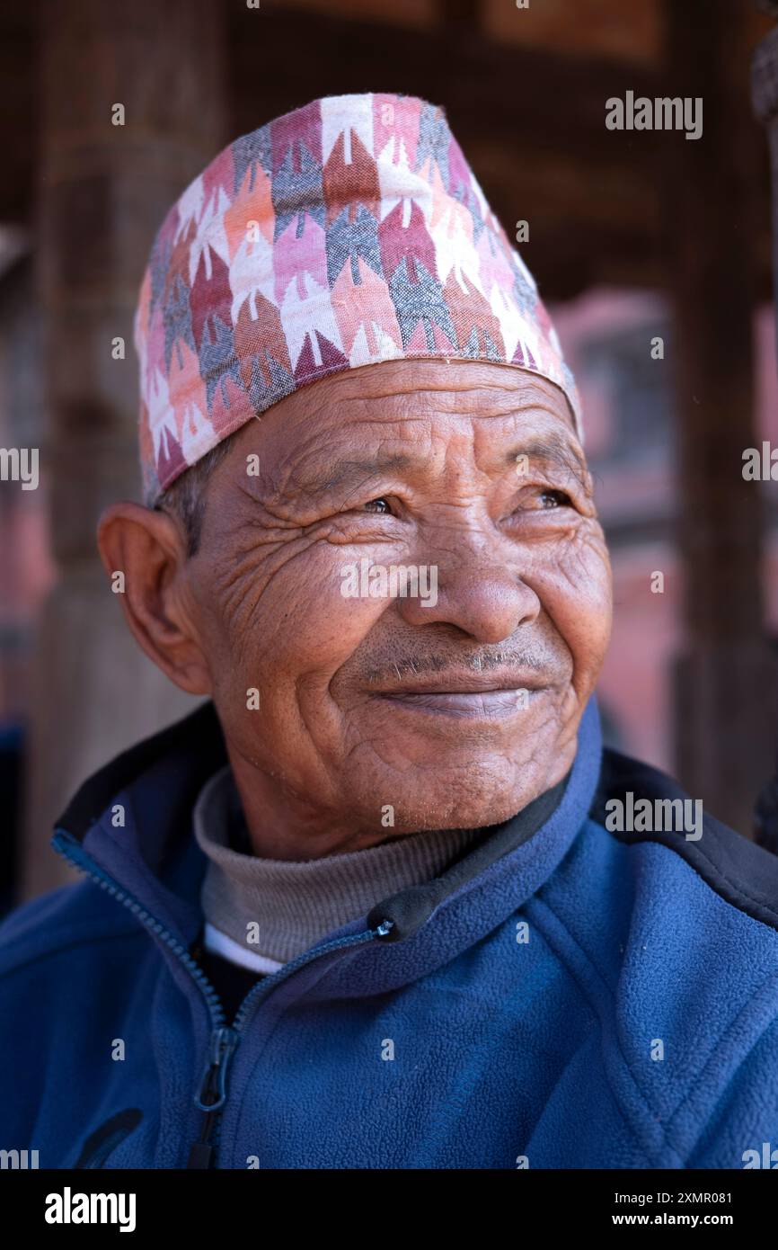 Nepalese gentleman wearing traditional dhaka topi cap or hat in streets ...