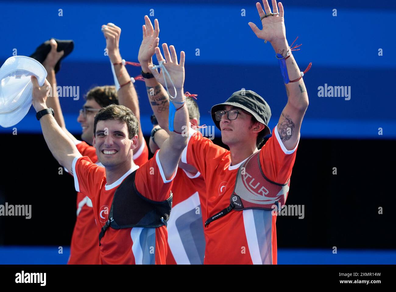 Turkey's Berkim Tumer, left, and Turkey's Mete Gazoz celebrate during ...