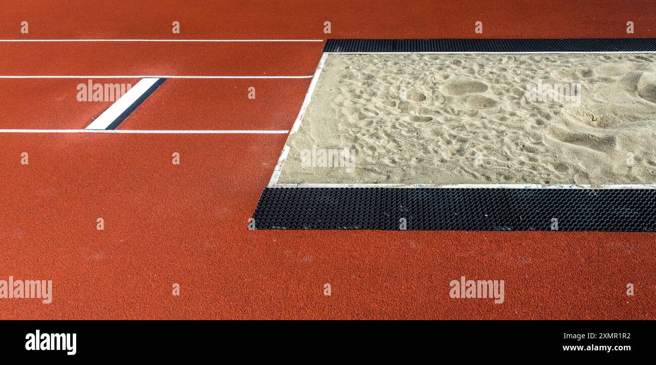 Long jump pit in a stadium. Horizontal sport theme poster, greeting ...