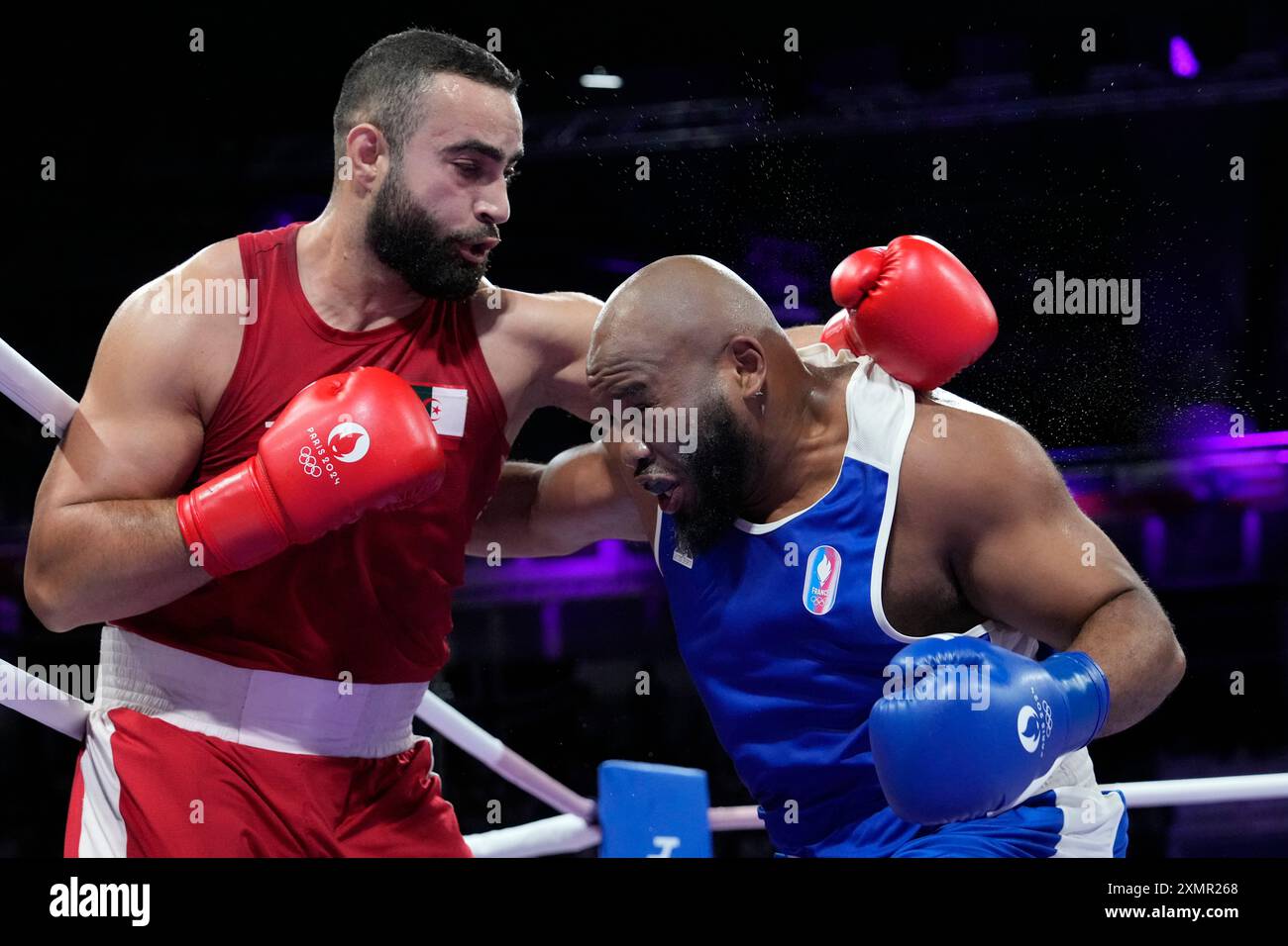 Algeria's Mourad Kadi, left, fights France's Djamili-Dini Aboudou in ...