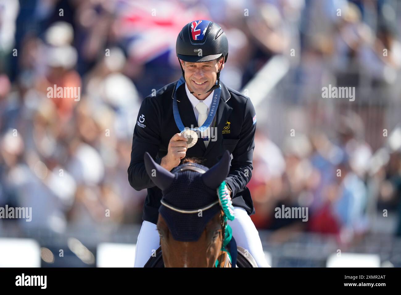 Australia's Christopher Burton, riding Shadow Man, celebrates his ...