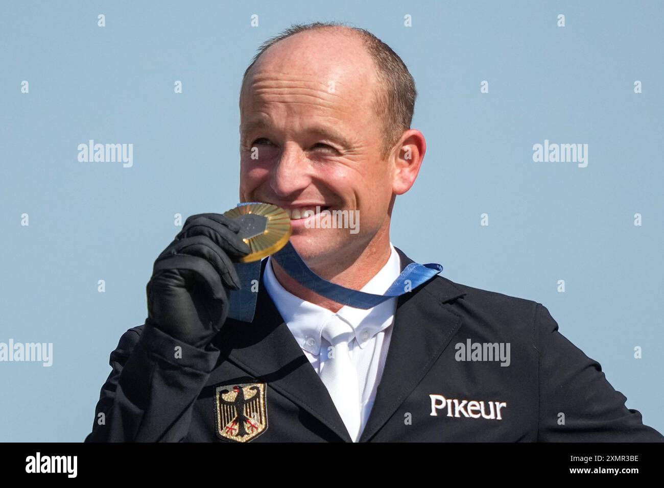 Germany's Michael Jung celebrates his gold medal in Equestrian Jumping ...