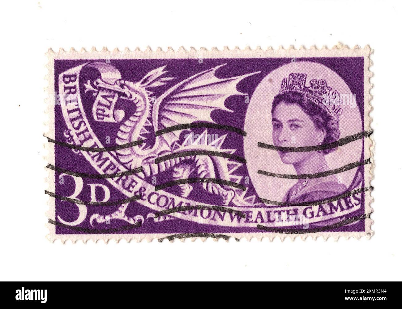 A vintage Queen Elizabeth II postage stamp featuring the British Empire ...