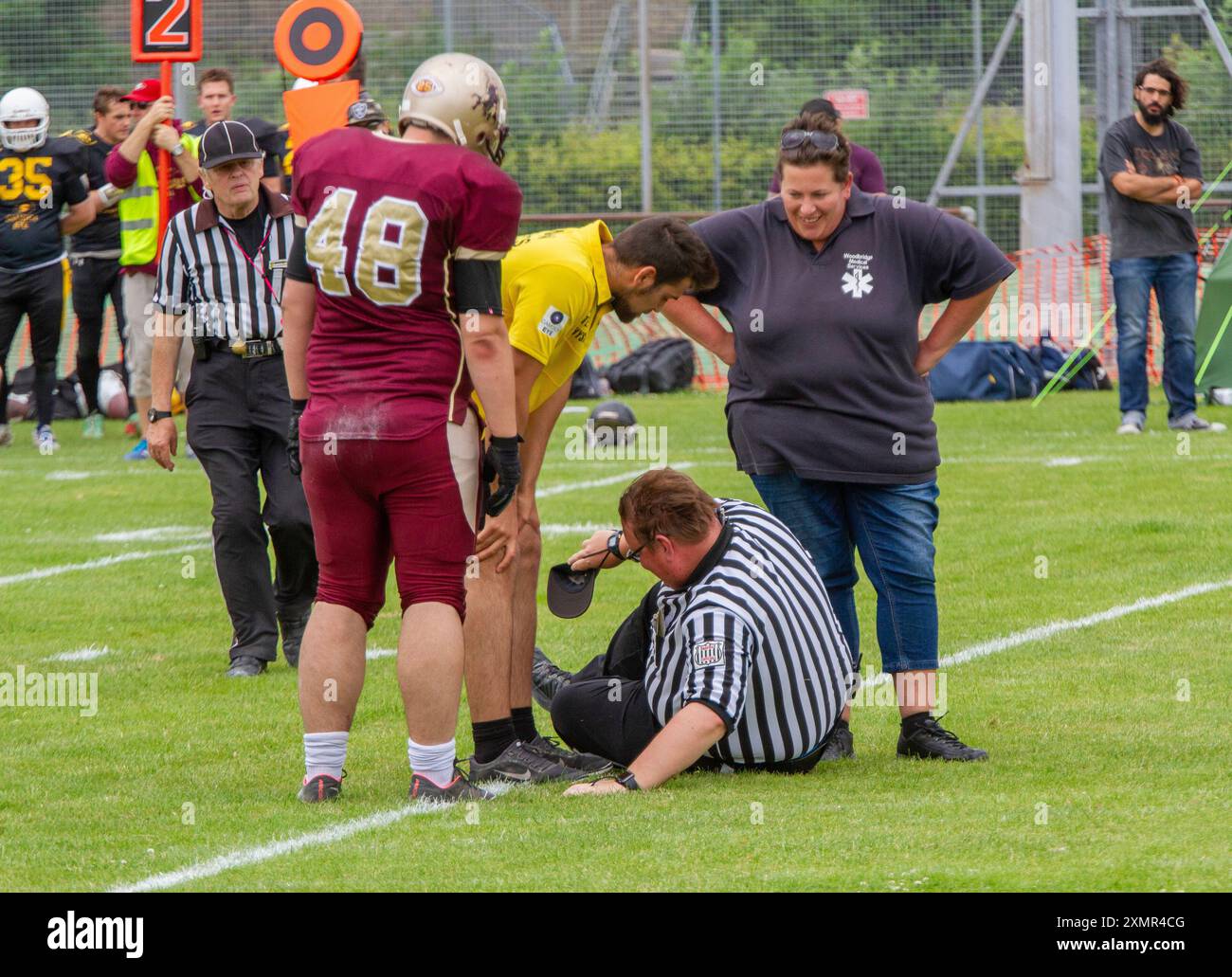 At an American football game in Ipswich UK a referee has fallen over ...