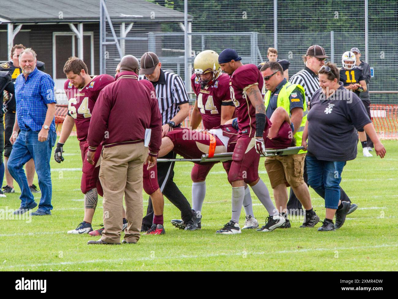 Injured player is carried off pitch hi-res stock photography and images ...