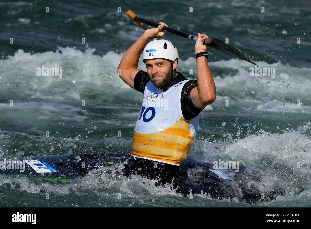 Liam Jegou of Ireland reacts at the finish line of the men's canoe ...