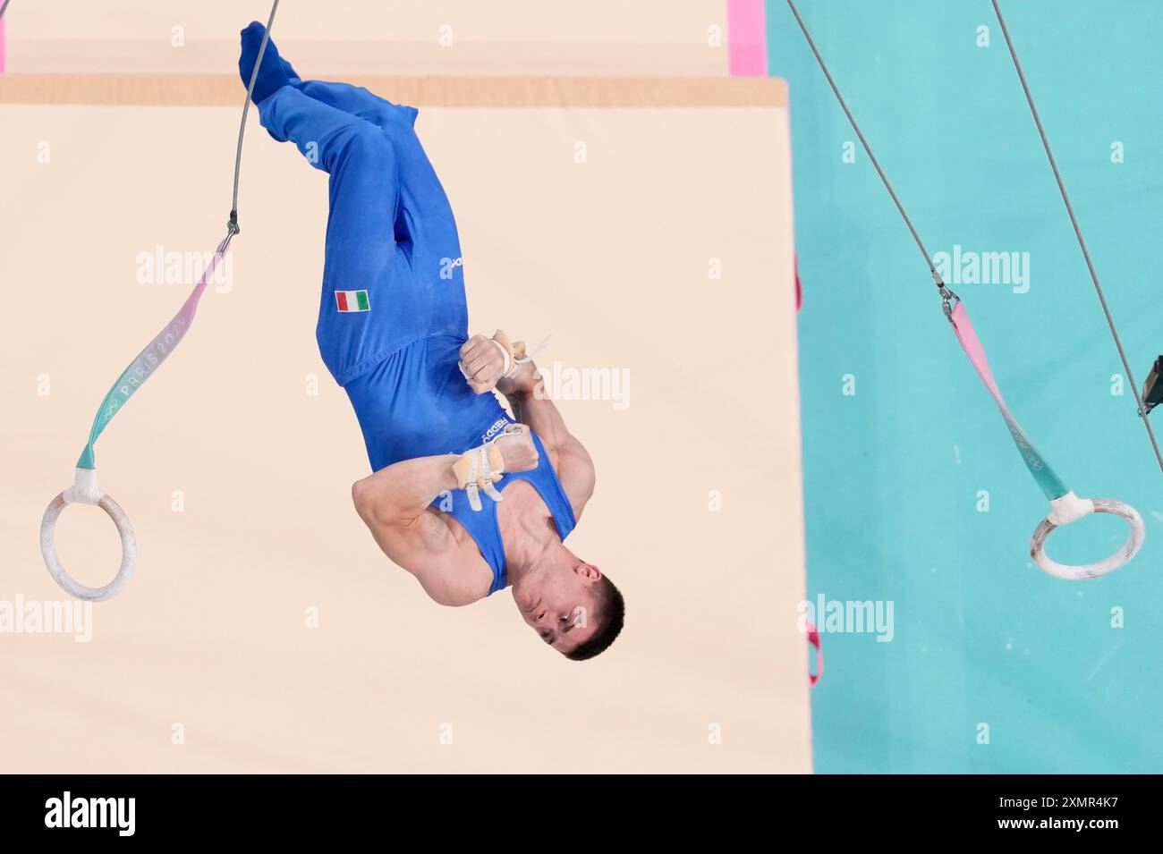 Mario Macchiati of Italy performs on the rings during the men's ...