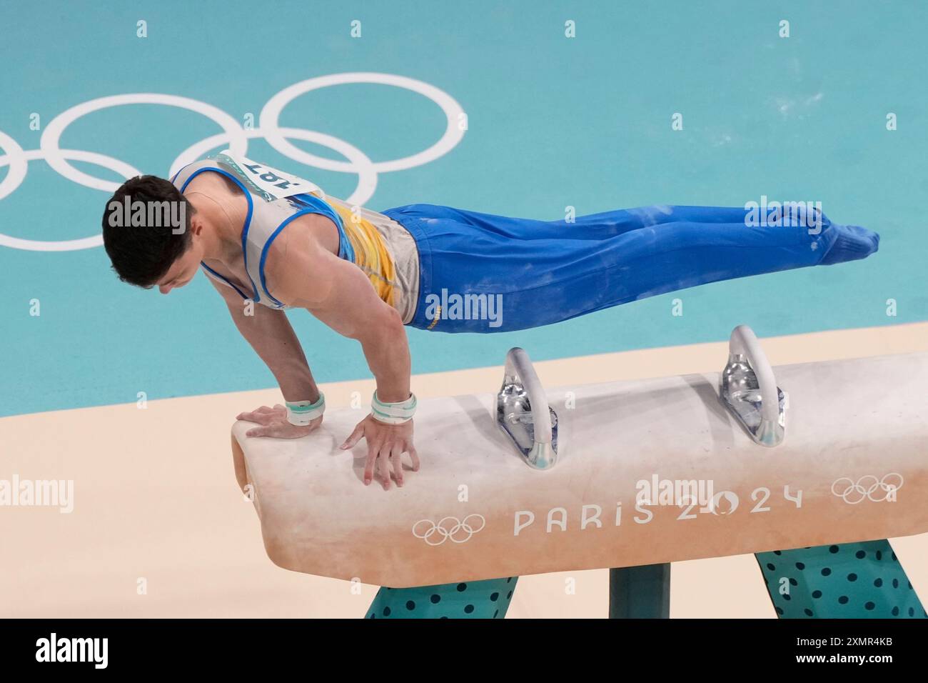 Radomyr Stelmakh of Ukraine performs on the parallel bars during the ...