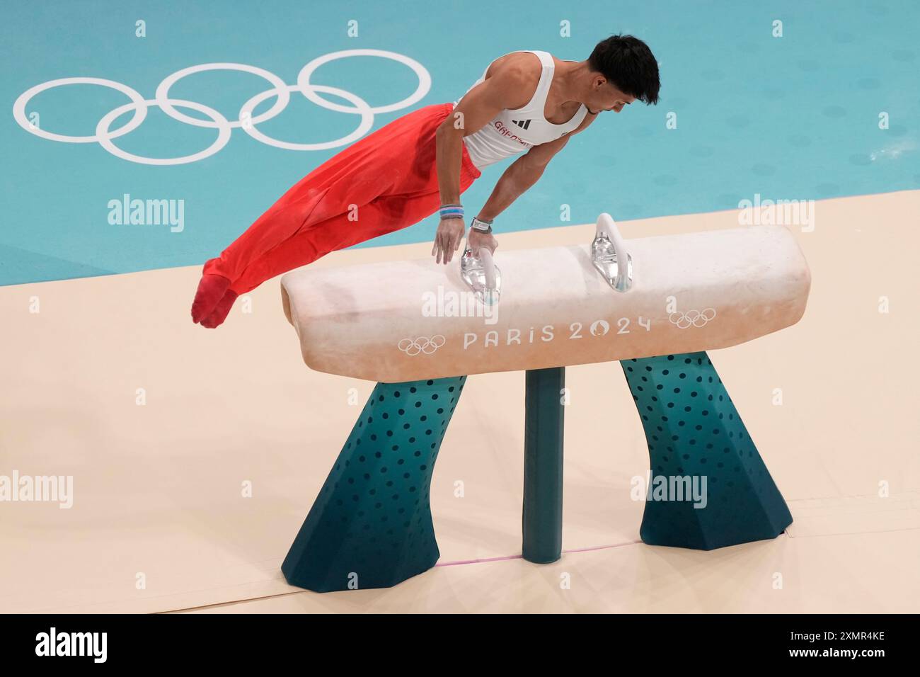ake Jarman of Great Britain performs on the parallel bars during the ...