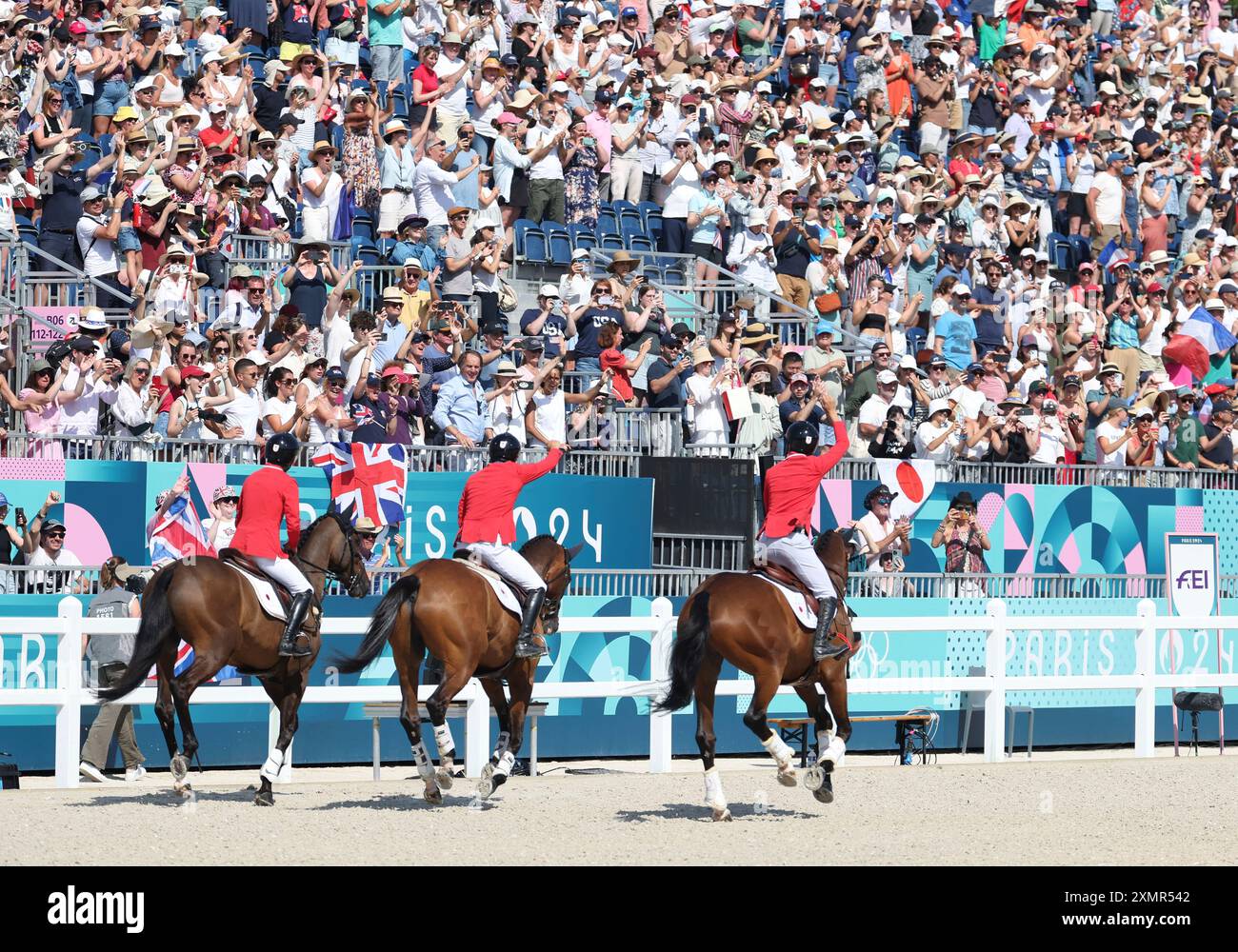 Team Japan celebrates after placing 3rd in the Equestrian Eventing Team ...