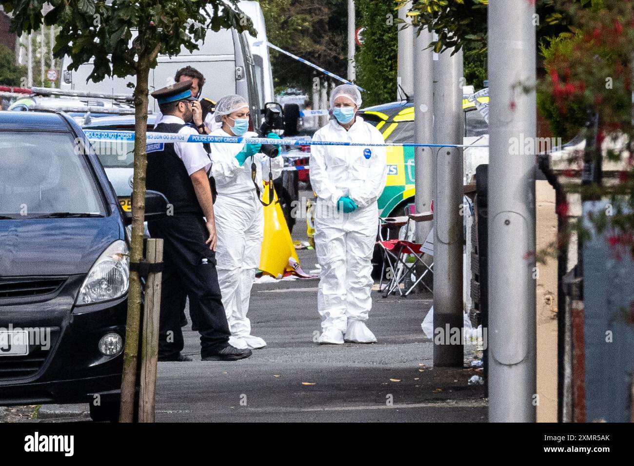 Forensic officers on Hart Street in Southport, Merseyside, where a man ...
