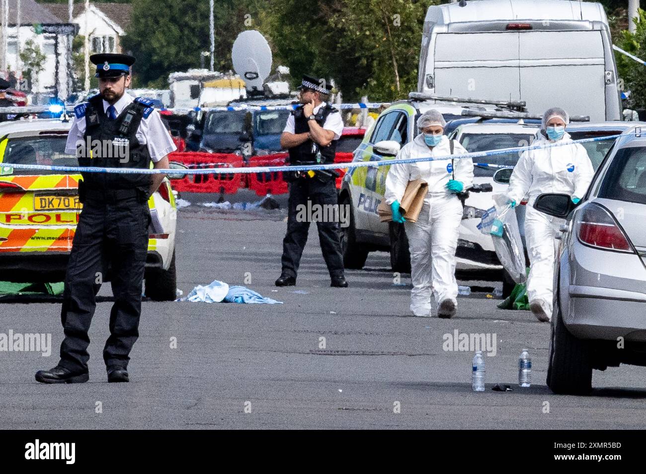 Forensic officers on Hart Street in Southport, Merseyside, where a man ...
