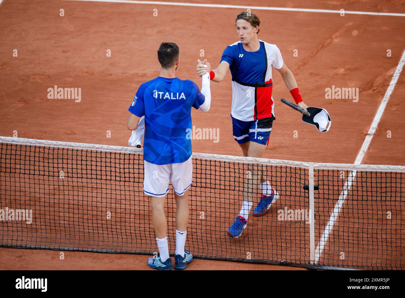 Andrea Vavassori of, Italy. , . and Casper Ruud of Norway after a men's ...