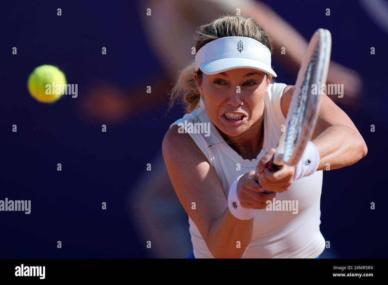 Danielle Collins of the United States returns a backhand shot to ...