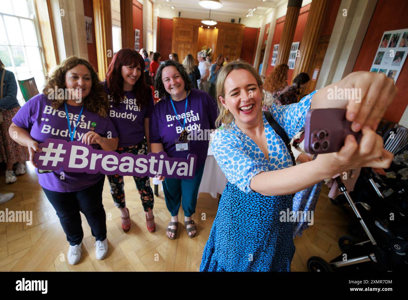 Kate Nicholl MLA takes a photo with the Breastival team Laura Ward, Dr ...