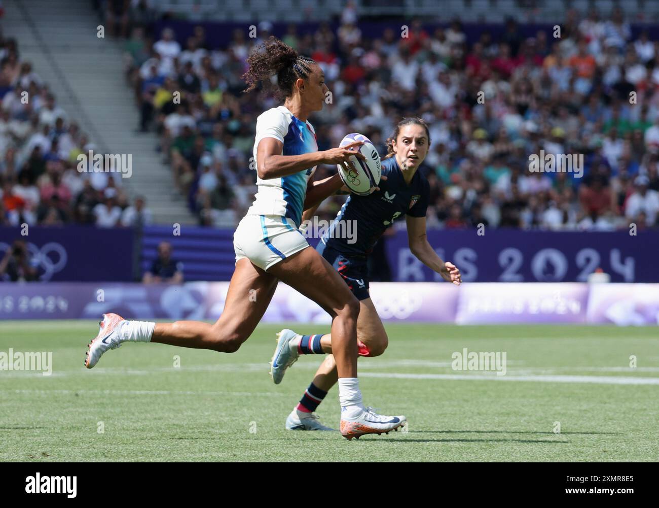 Paris, France. 29th July, 2024. Kayla Canette of the US (R) attempts to ...