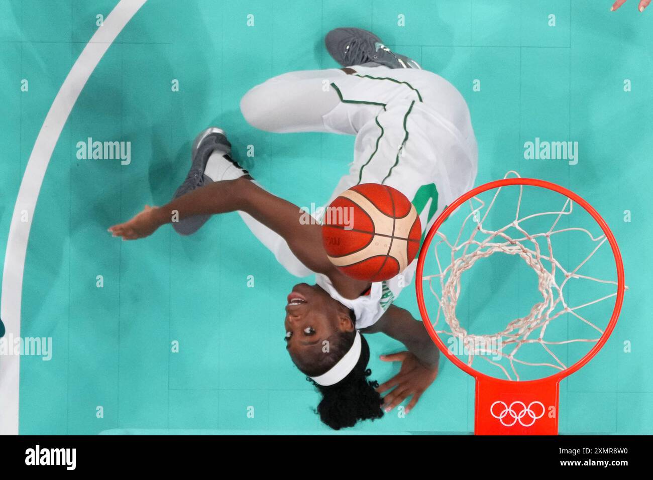 Promise Amukamara, of Nigeria, watches as he shot misses the rim after ...