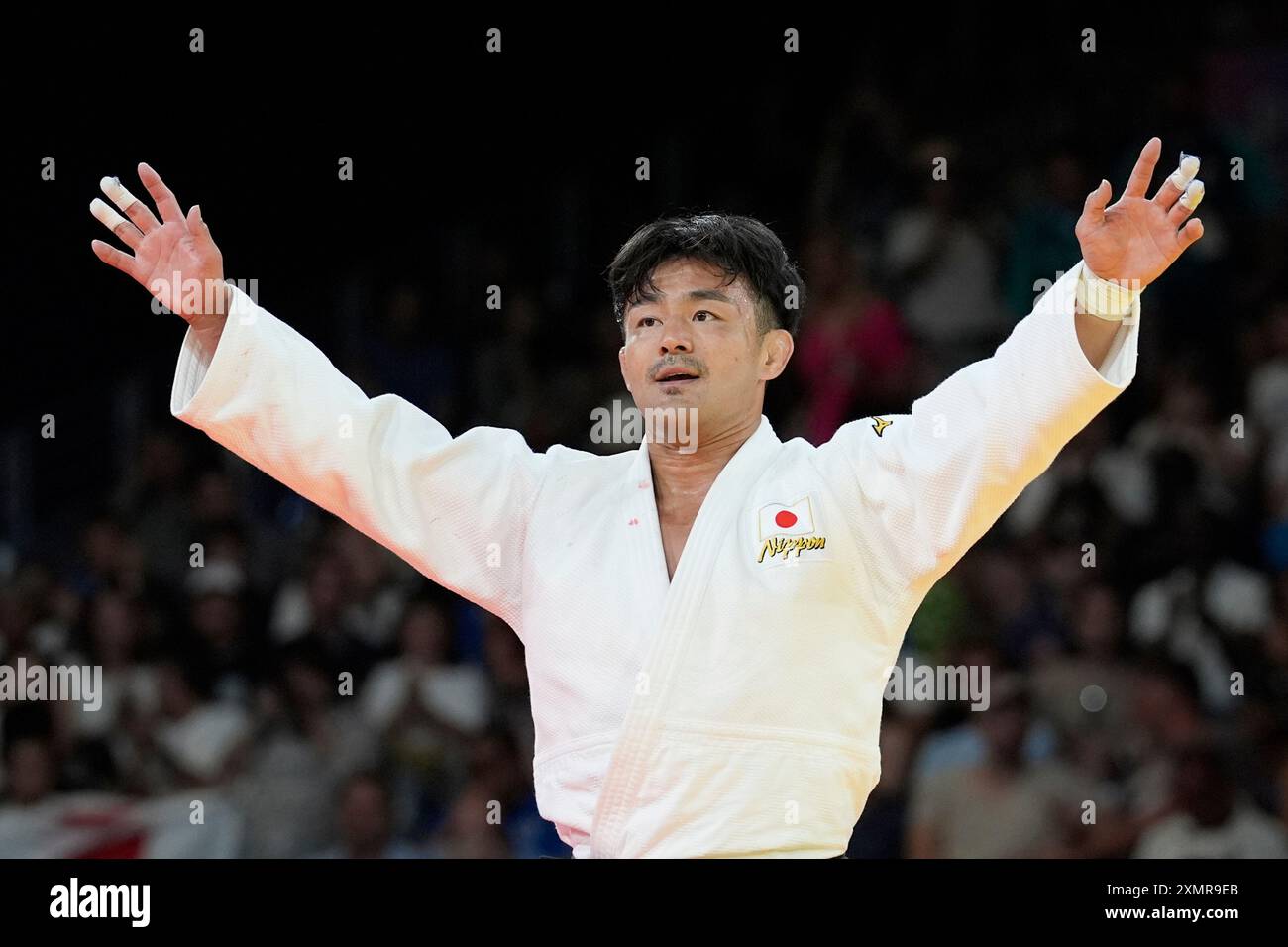 Japan's Soichi Hashimoto celebrates after defeating Kosovo's Akil ...