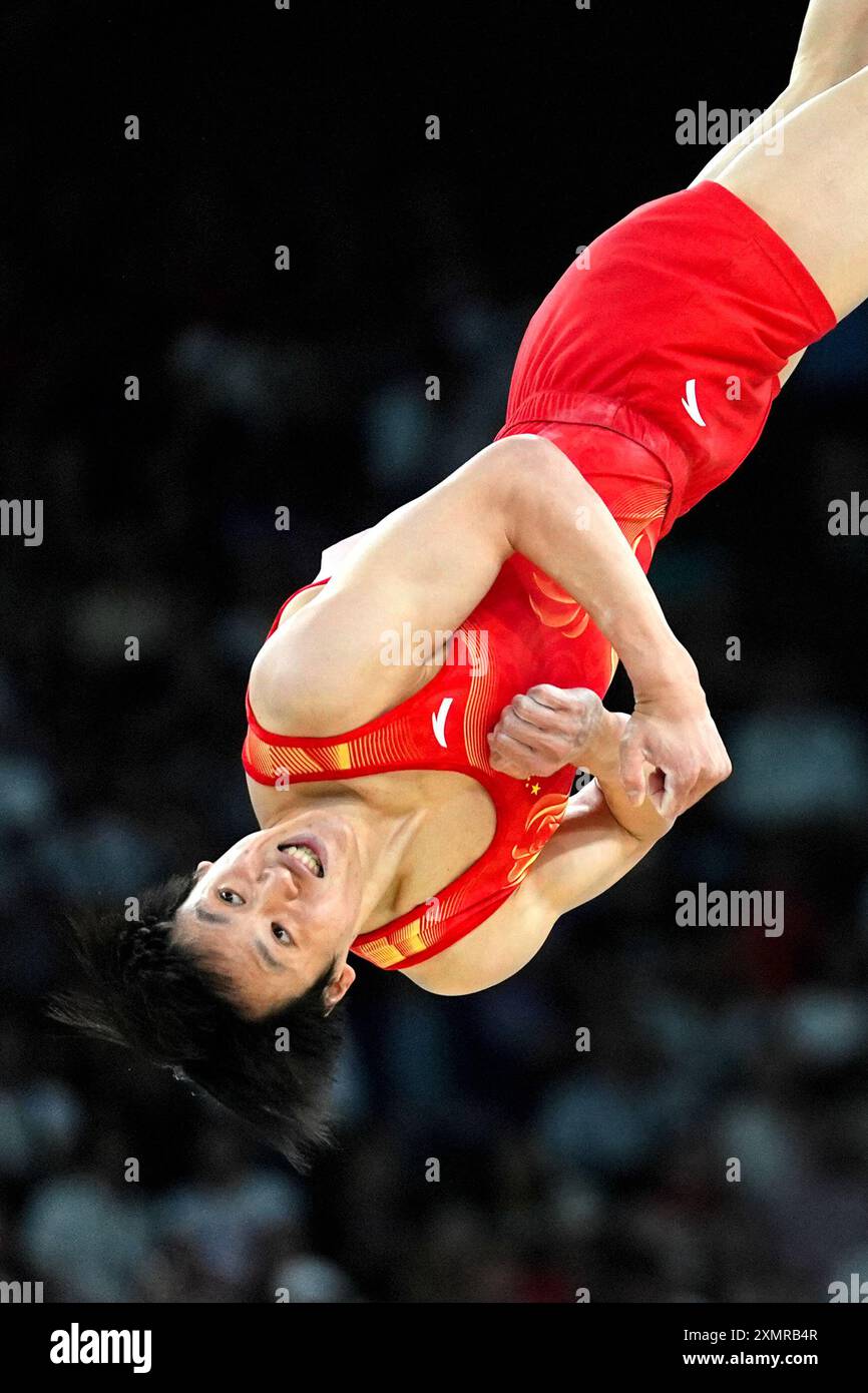 Sun Wei, of China, performs in the floor exercise during the men's ...