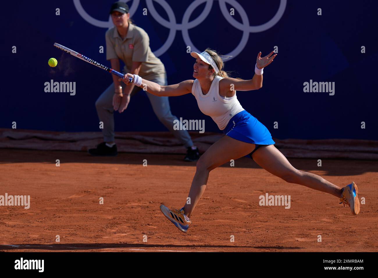 Danielle Collins of the United States returns a forehand shot to ...