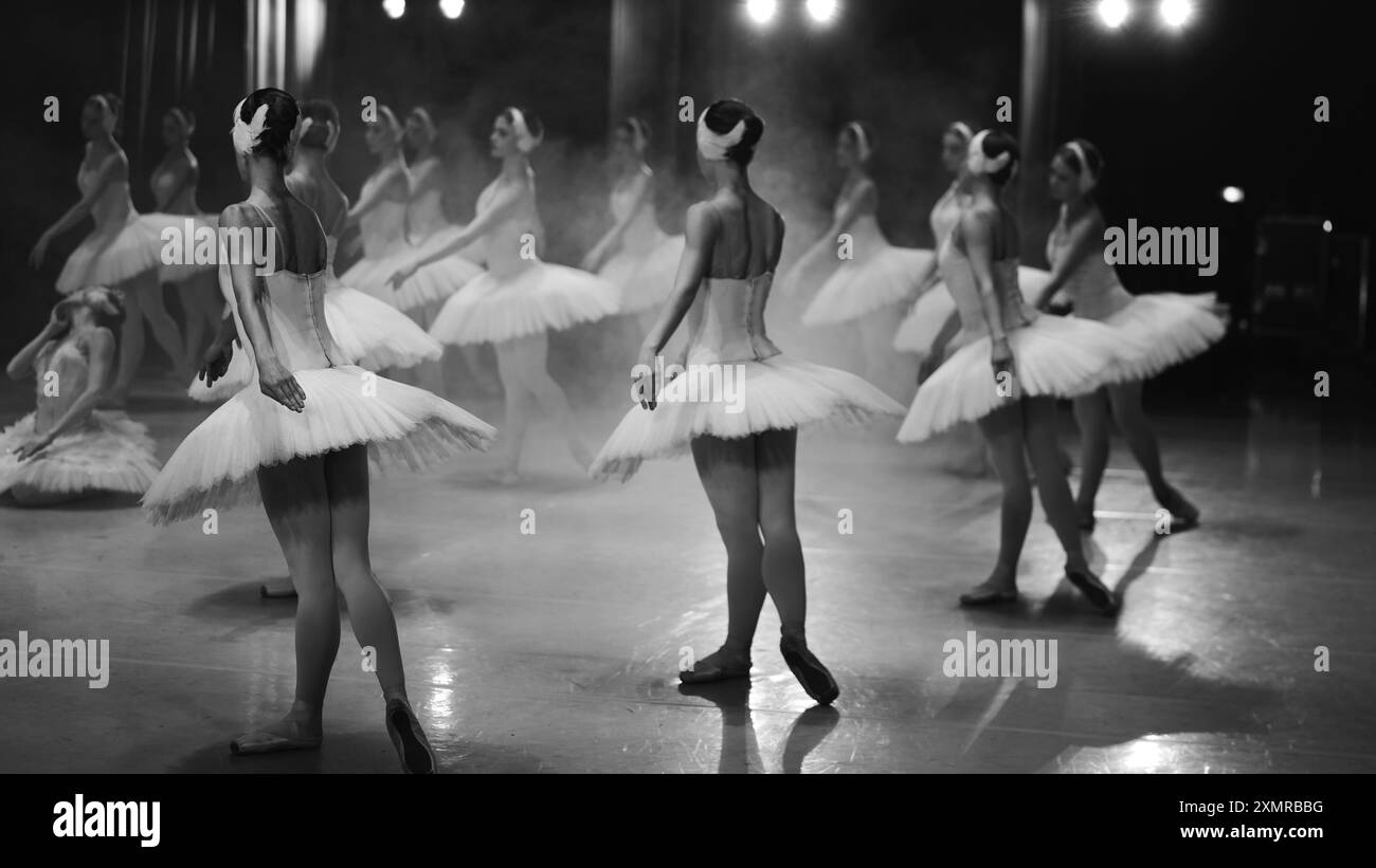Ballerinas in white tutus, view from backstage. Black and white photos ...