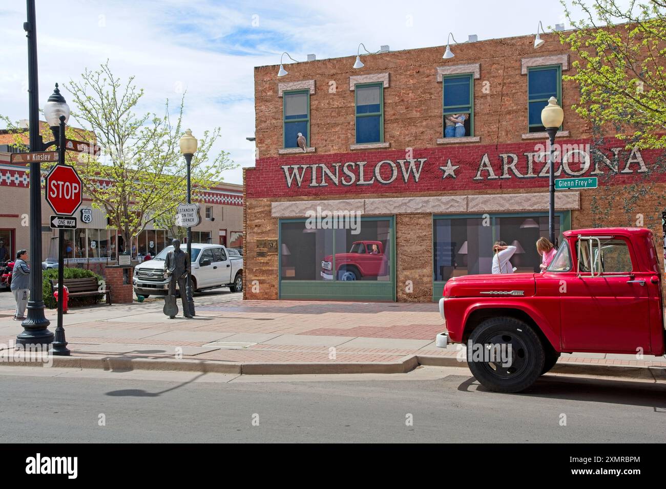1960 flatbed Ford parked before brick wall commemorating Eagles ’Take ...