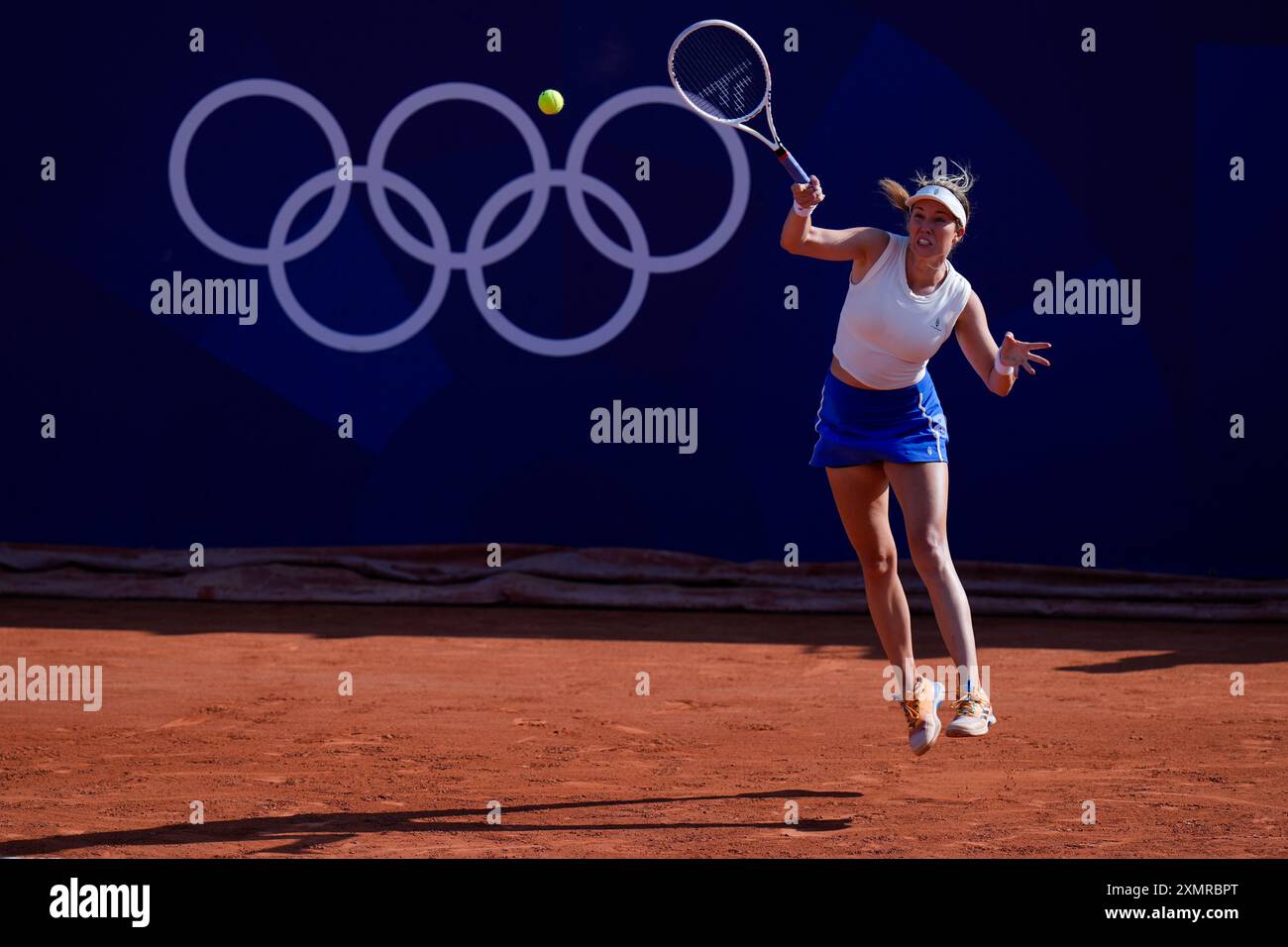 Danielle Collins of the United States hits a forehand shot to Caroline ...