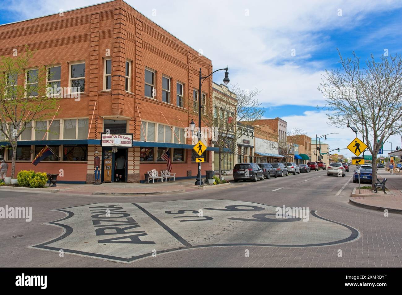 Street painted Route 66 shield at intersection of famous Standin' on ...