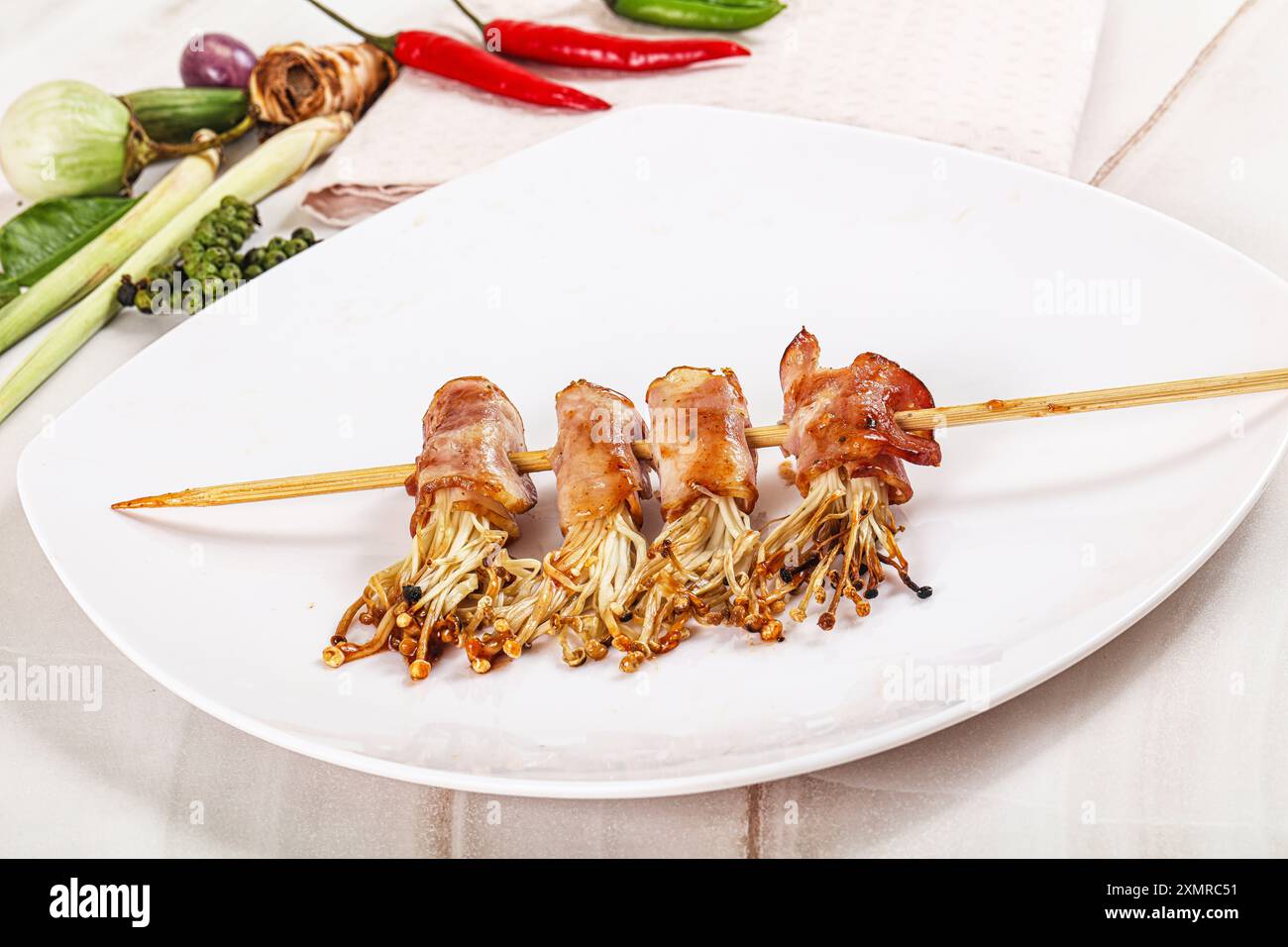 Thai Street foof satay with bacon and mushroom enoki skewer Stock Photo ...