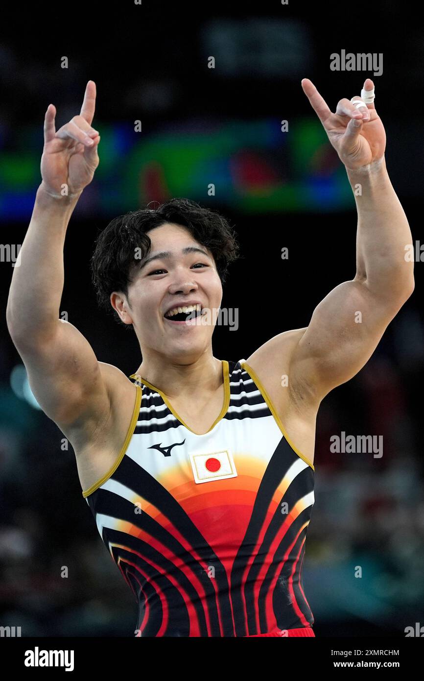 Shinnosuke Oka, of Japan, celebrates after performing in the floor ...
