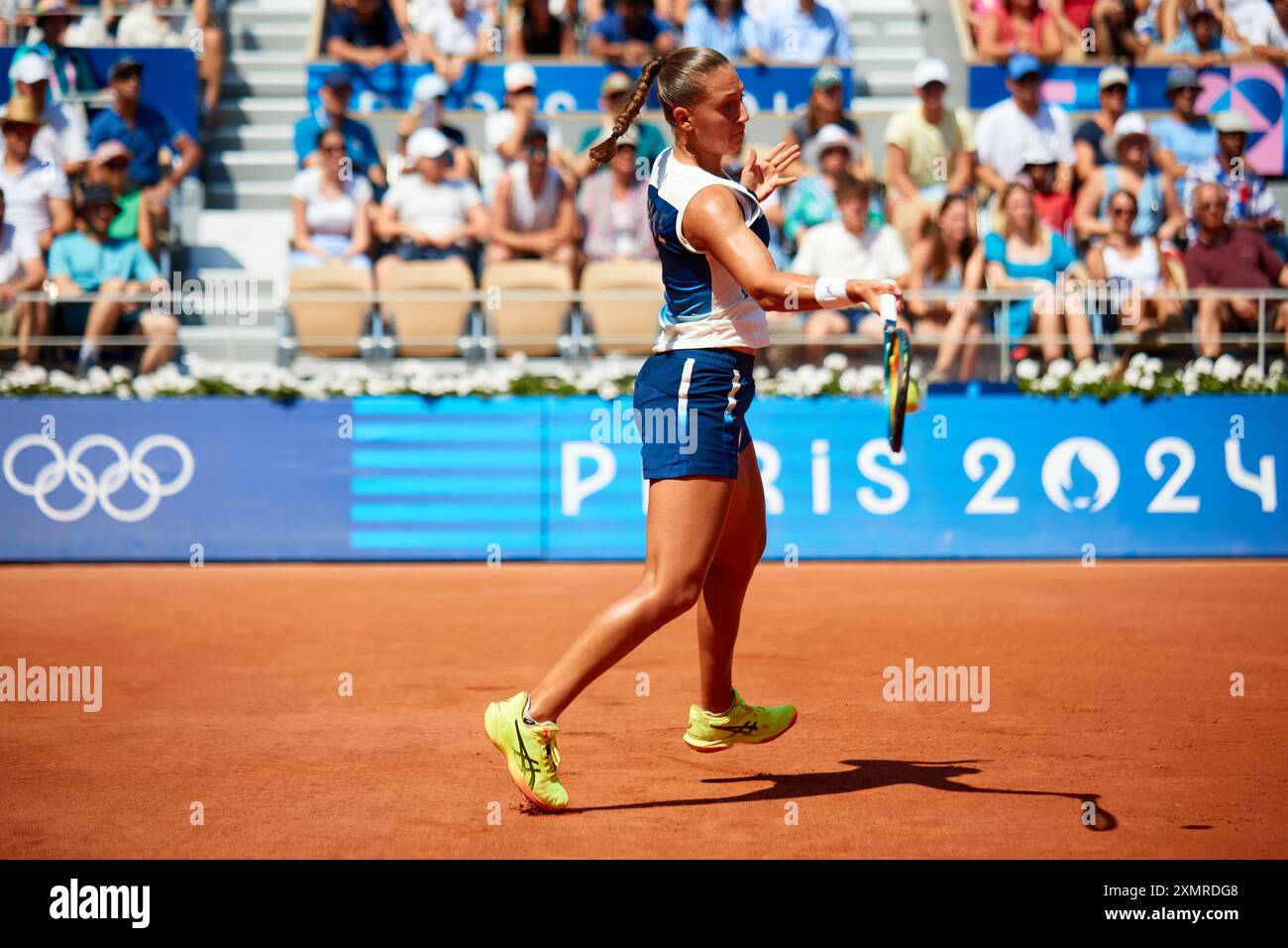 Diane Parry of France in action against during Iga Swiatek of Poland ...