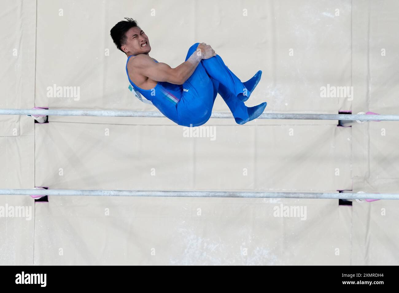 Lorenzo Minh Casali of Italy performs on the parallel bars during the ...