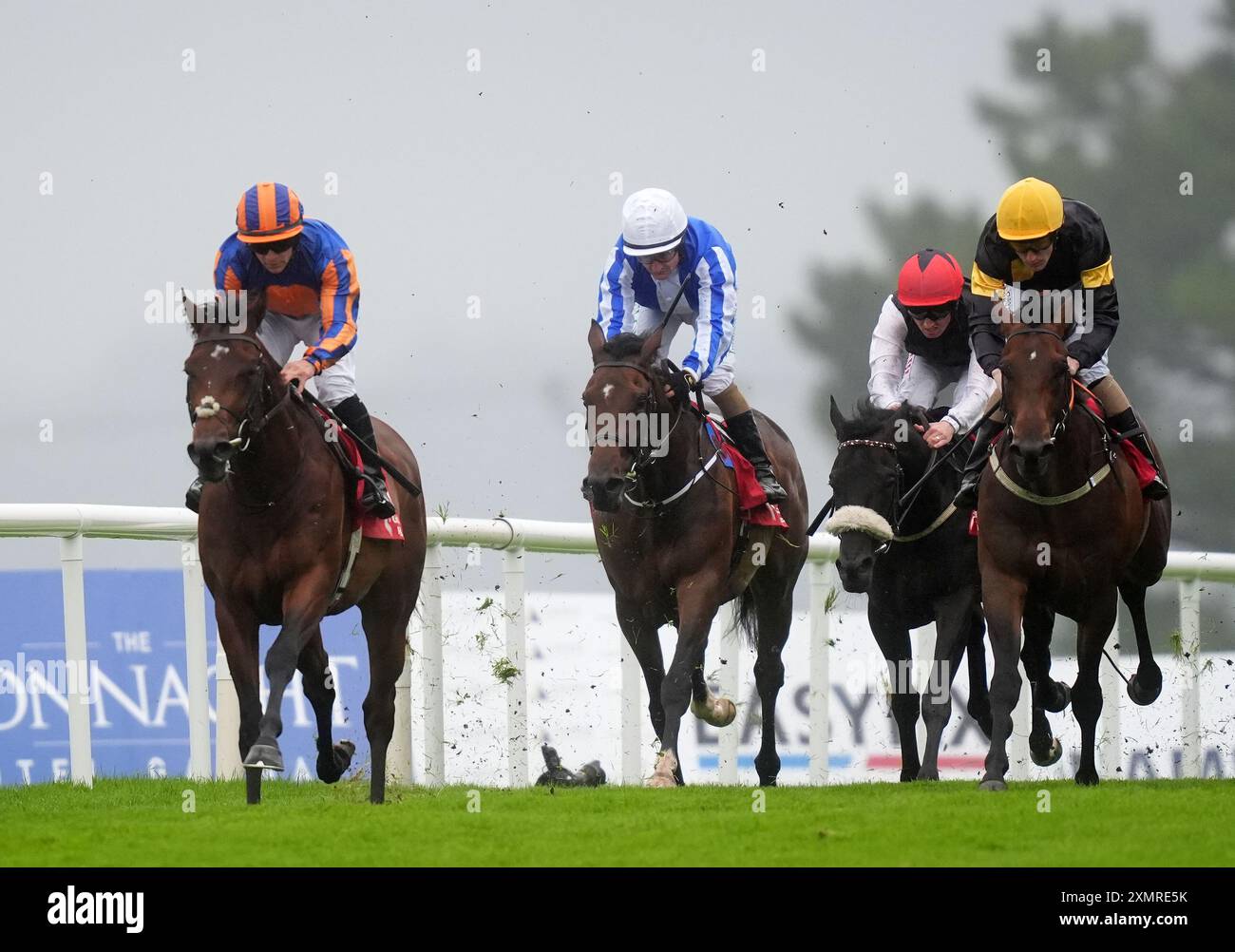 Rock Of Cashel ridden by jockey Wayne Lordan (left) on their way to ...
