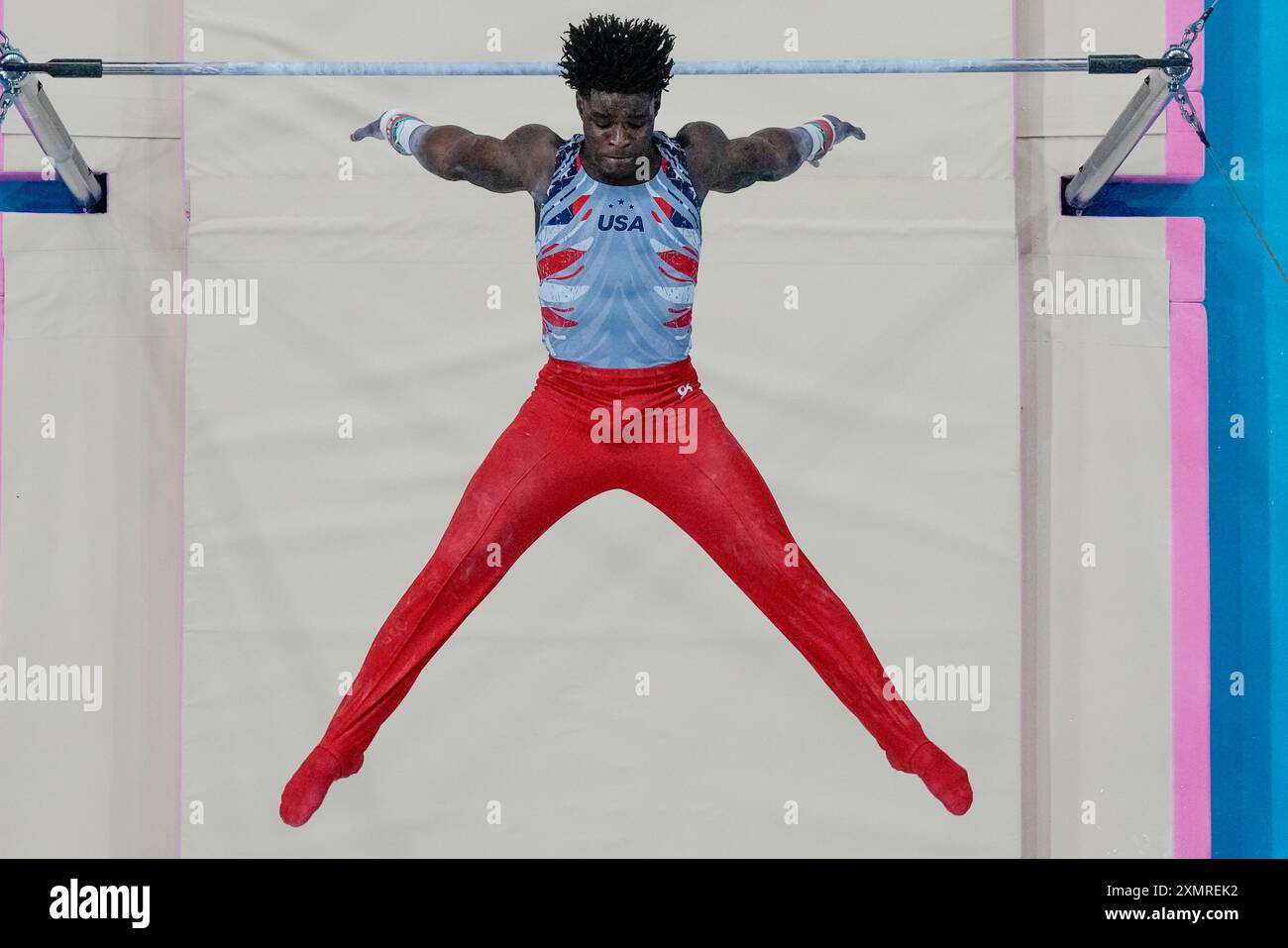 Frederick Richard of the United States performs on the horizontal bar ...