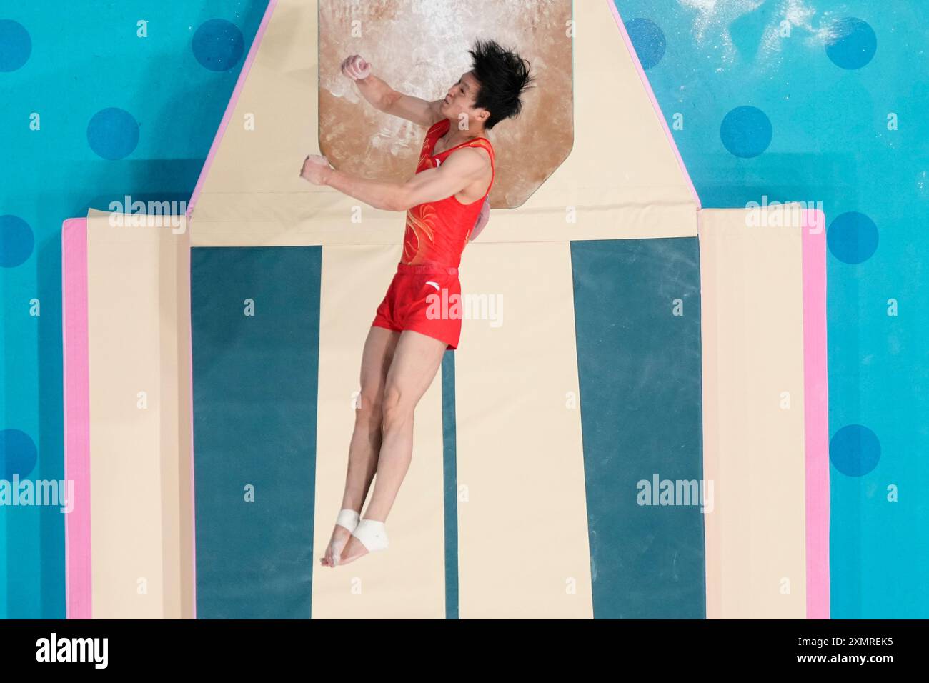 Su Weide of China performs on the vault during the men's artistic ...