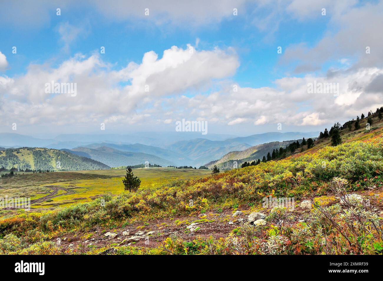 Cloudy sky covers mountain range hi-res stock photography and images ...