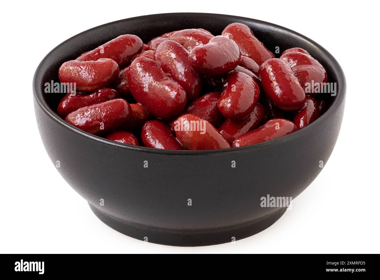 Cooked red kidney beans in a black ceramic bowl isolated on white Stock ...