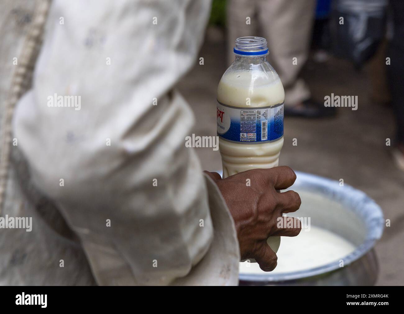 Bangladeshi man with a milk bottle for ramadan iftar, Dhaka Division, Dhaka, Bangladesh Stock ...