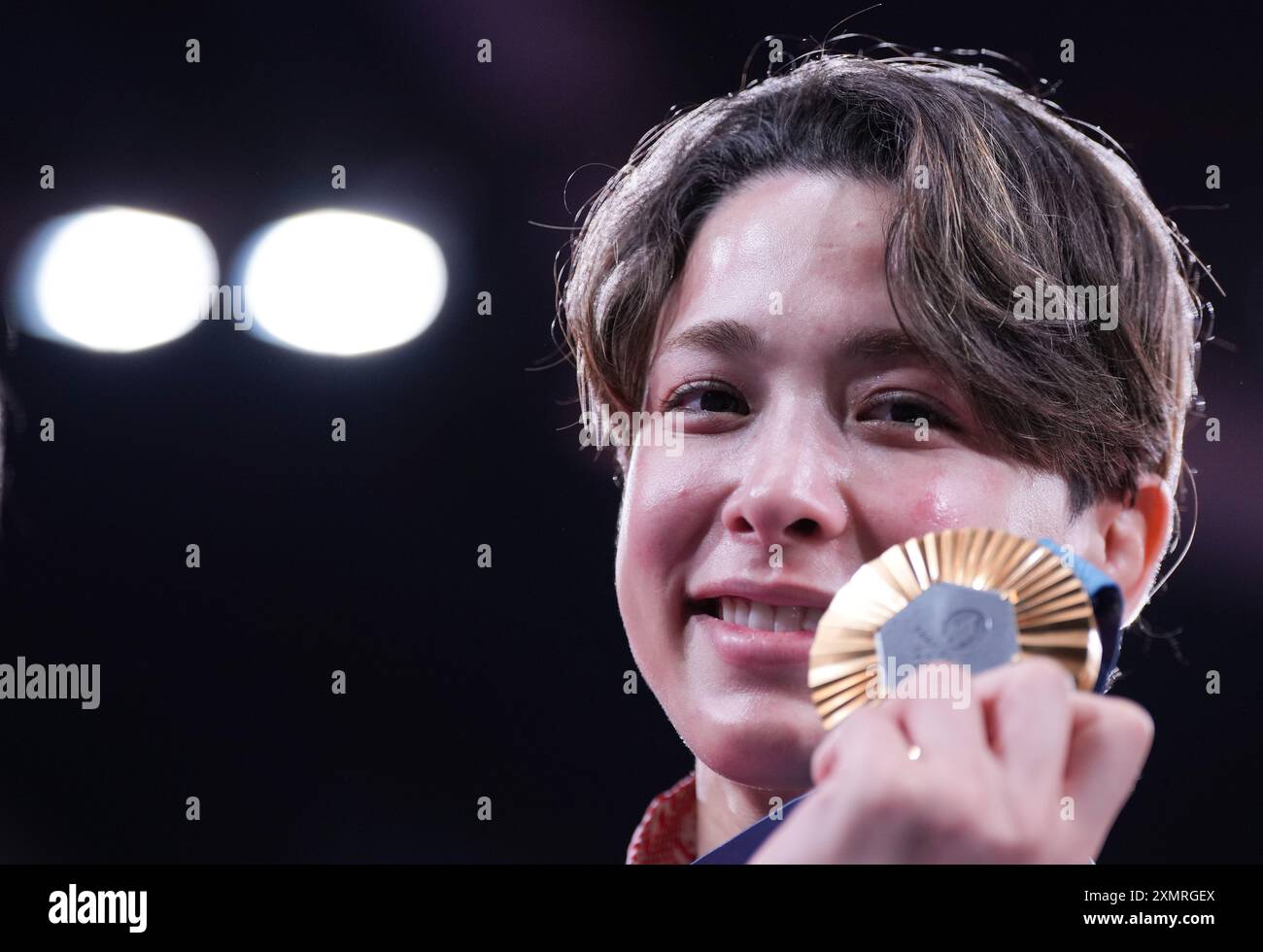 Paris, France. 29th July, 2024. Canada's Christa Deguchi holds her gold ...