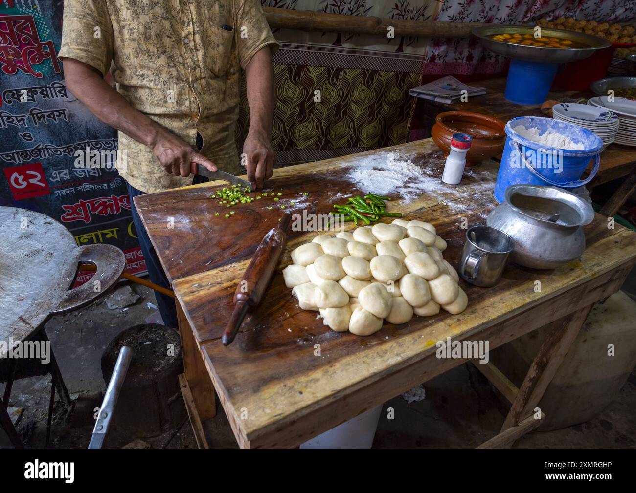 Bangladeshi man cooking inside a local restaurant, Dhaka Division ...
