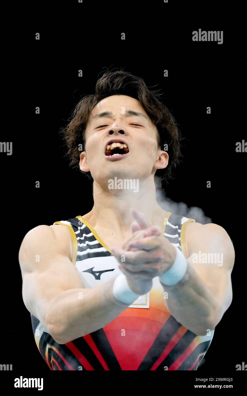 Takaaki Sugino, of Japan, celebrates after performing on the pommel ...