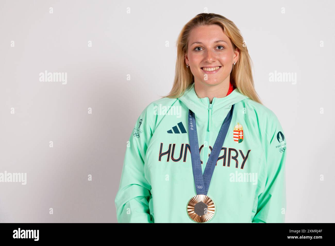 Hungary's Eszter Muhari, bronze medalist in fencing poses during a ...