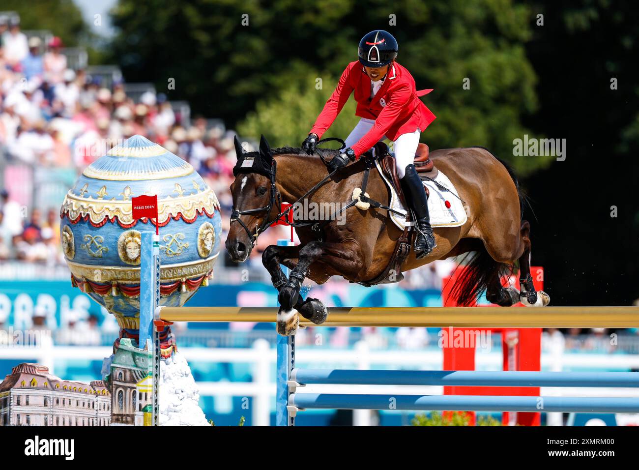 Kazuma Tomoto of Japan and horse Vinci de la Vigne compete during the ...