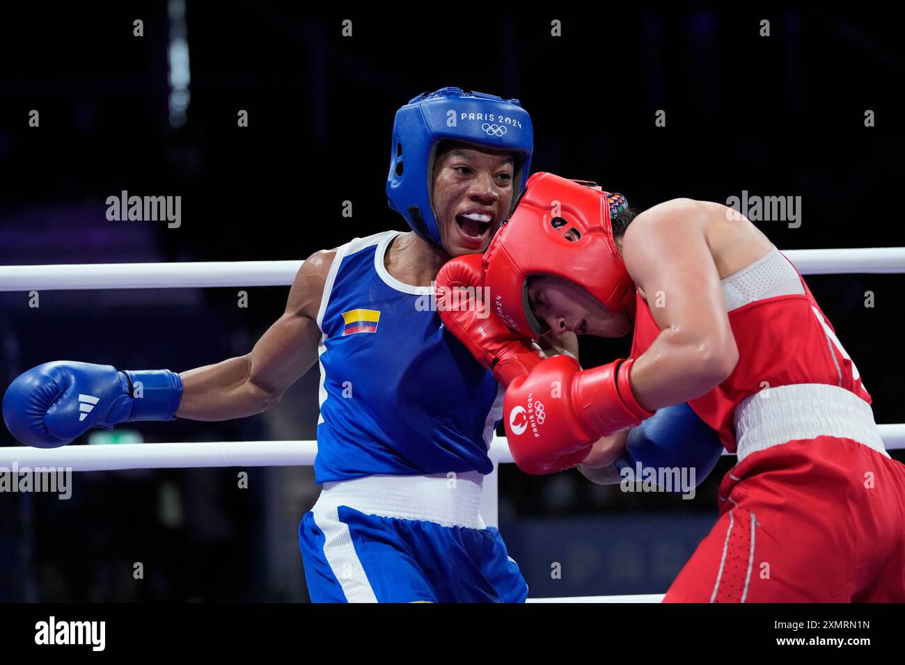 Kosovo's Donjeta Sadiku, right, fights Colombia's Angie Valdes in their ...