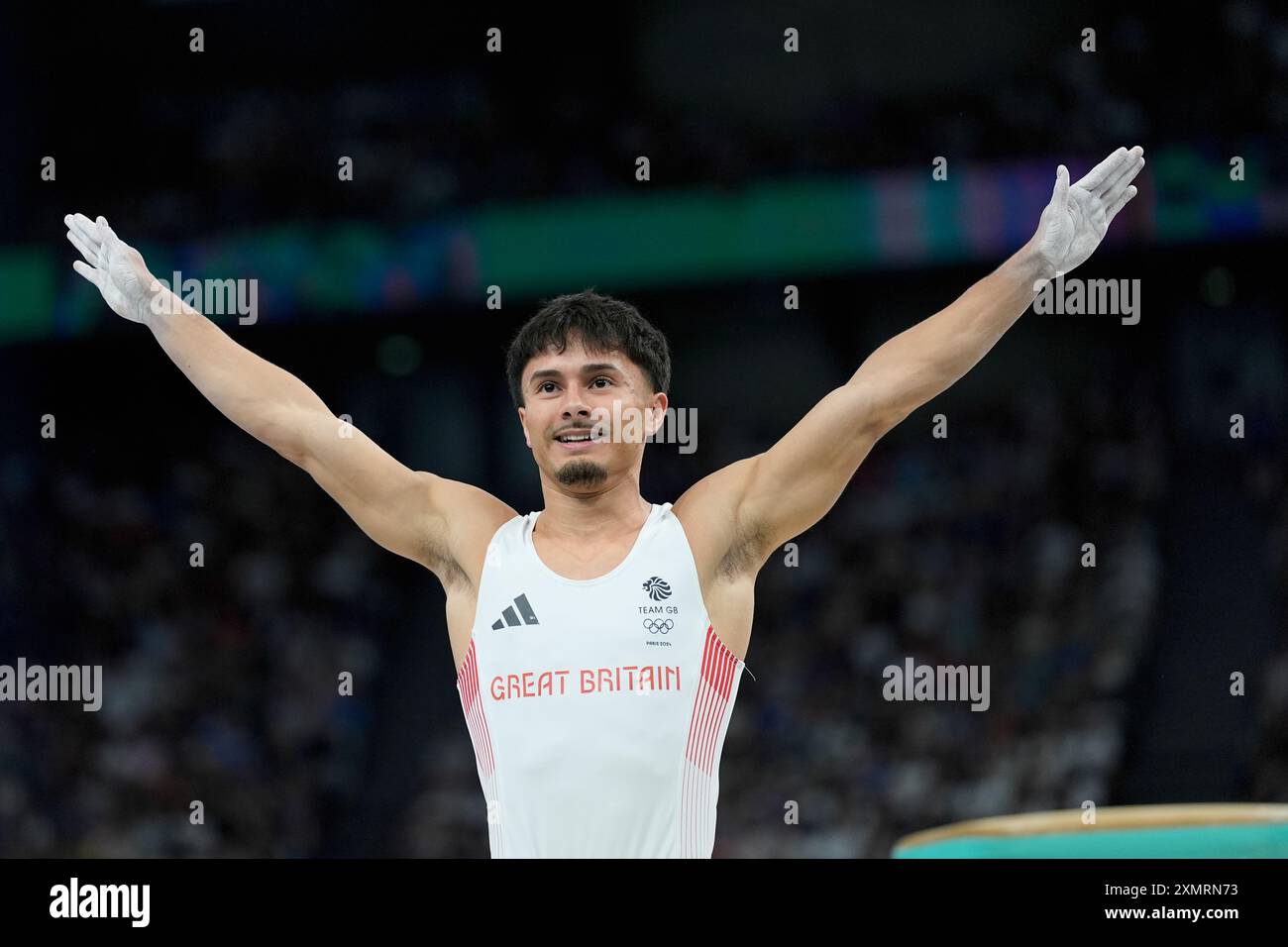 Jake Jarman, of Britain, celebrates after performing on the vault ...