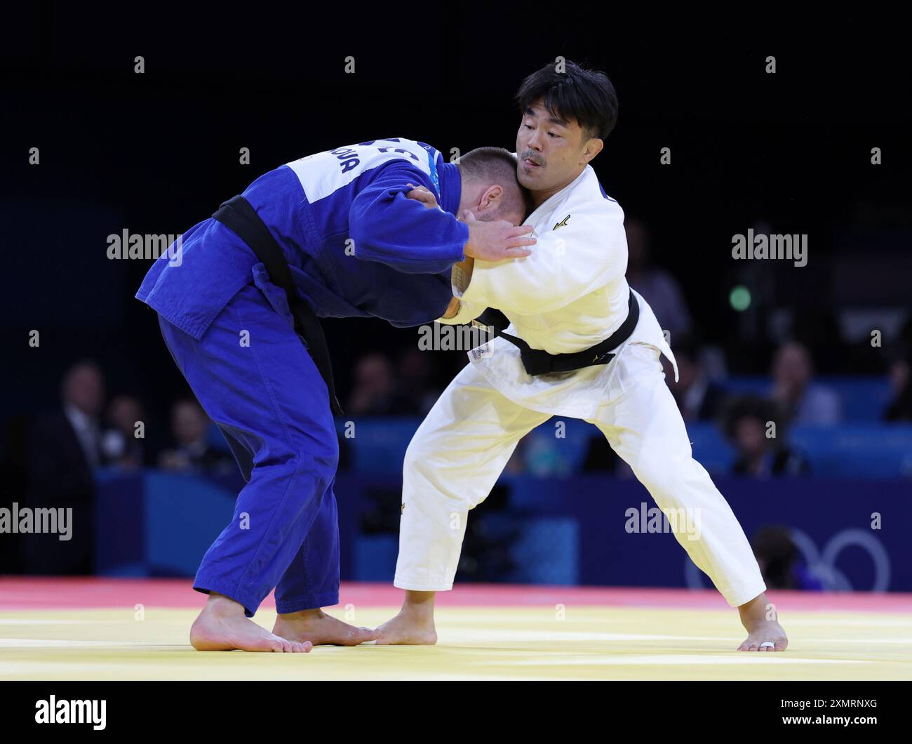 Japan's HASHIMOTO Soichi(white) and Kosovo's GJAKOVA Akil compete ...
