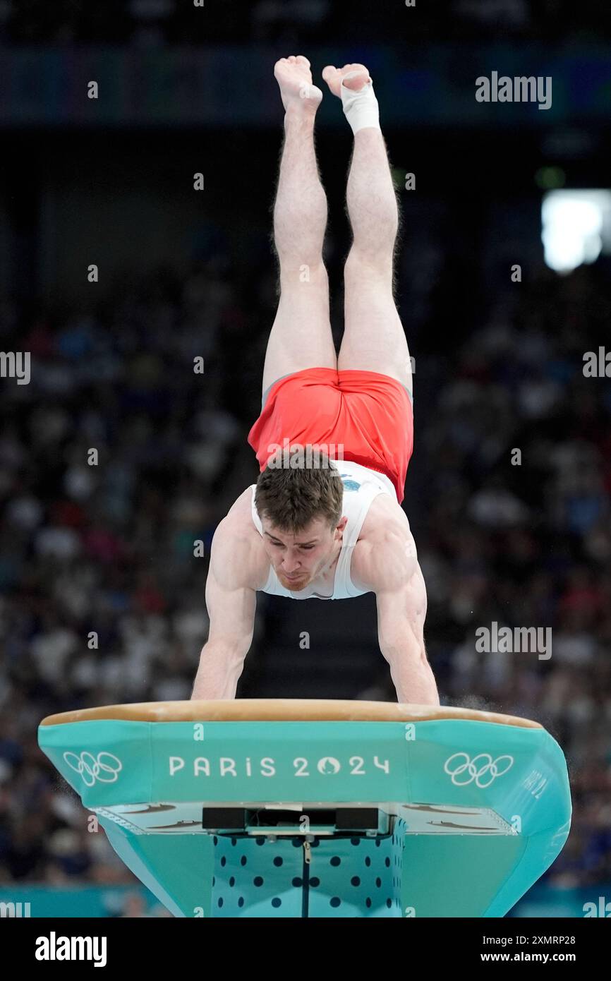 Harry Hepworth, of Britain, performs on the vault during the men's ...