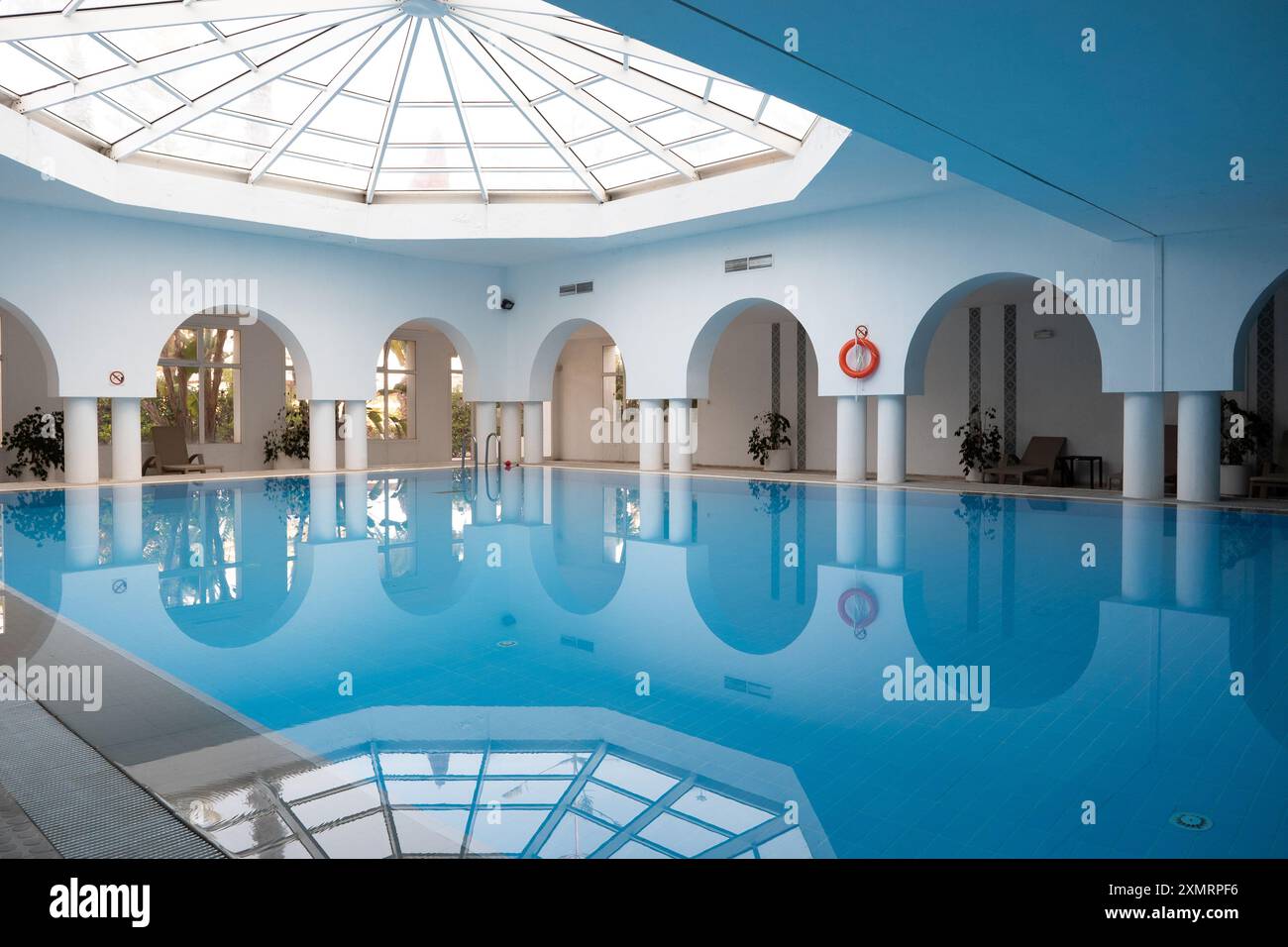 Modern interior swimming pool, arab style in a resort in Tunisia Stock ...