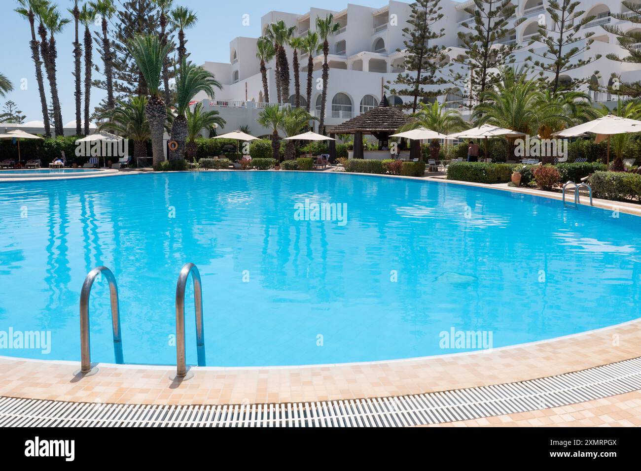 At swimming poolside hi-res stock photography and images - Alamy